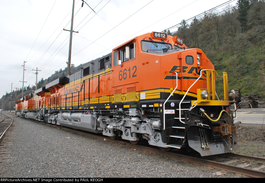 BNSF 6612 leads a 3 Very Brand New ES44C4 consist as they wait for the return !st Revenue east ...